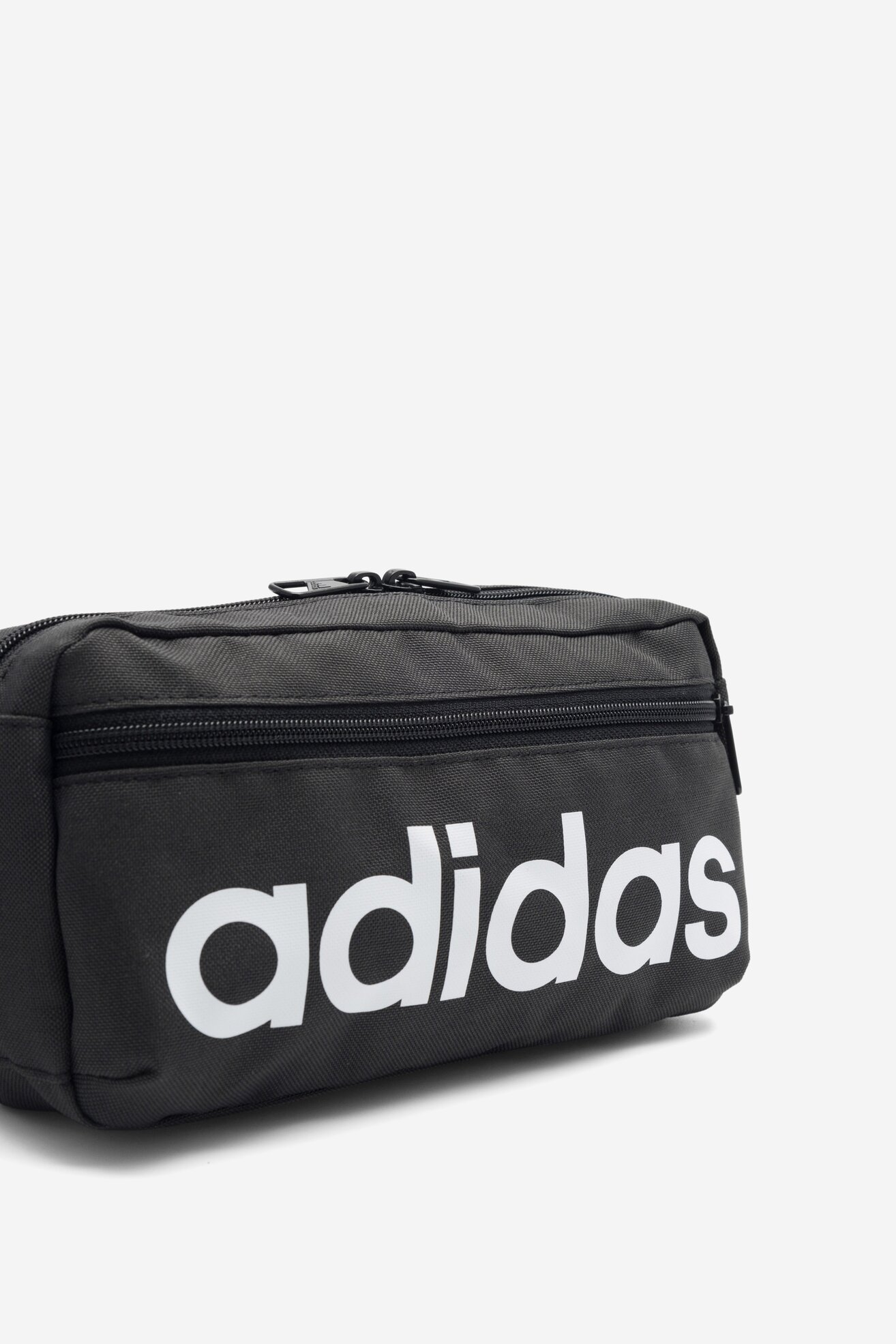 Torebka młodzieżowa adidas LINEAR BUM BAG HT4739 Czarny - CCC.eu