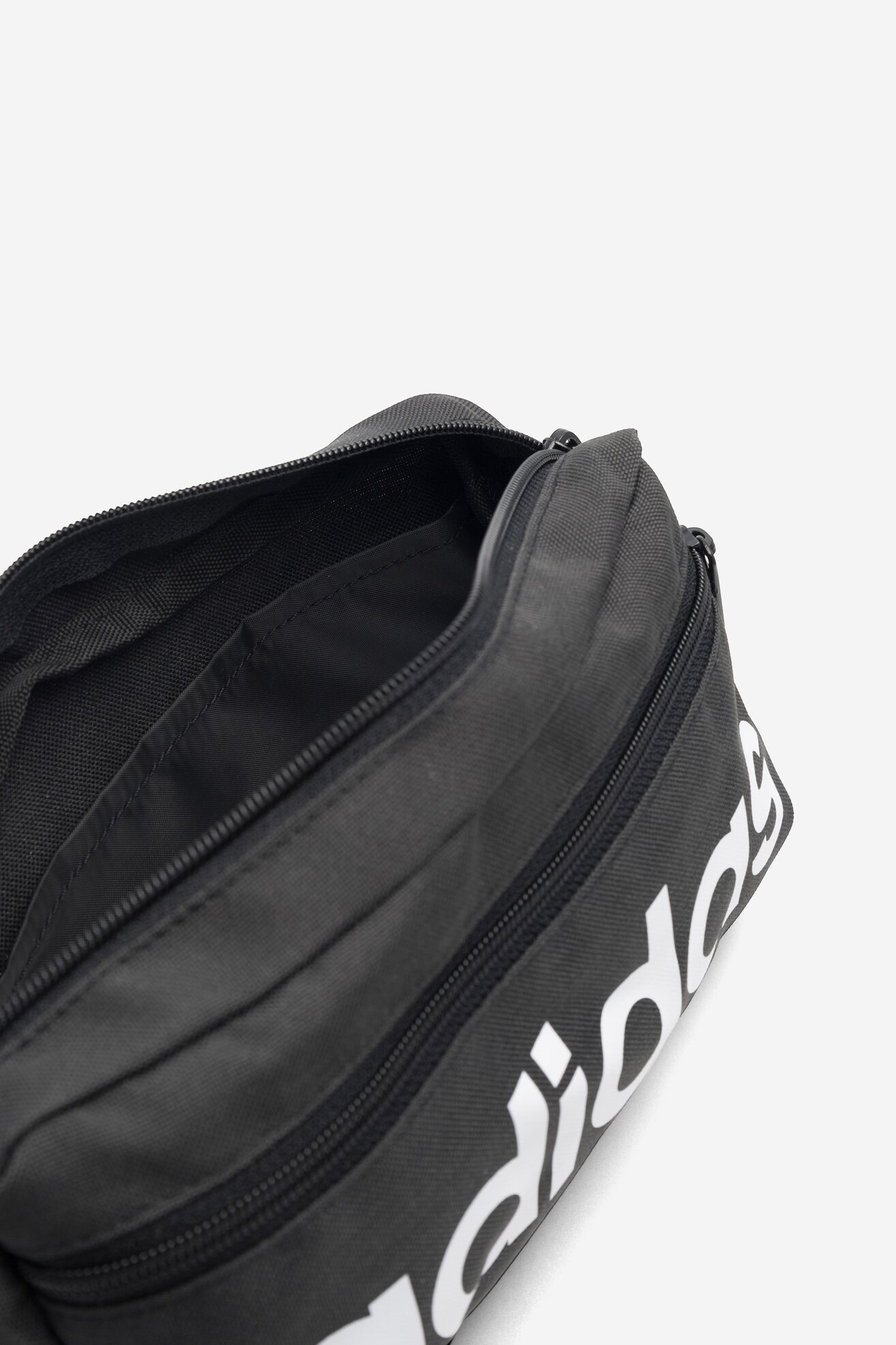 Torebka młodzieżowa adidas LINEAR BUM BAG HT4739 Czarny - CCC.eu